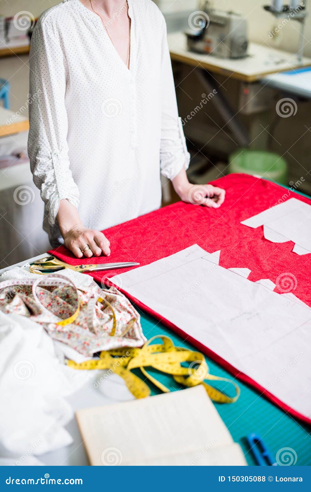 Hands of Lady Tailor Working in Her Studio, Tools and Fabric Samples on ...