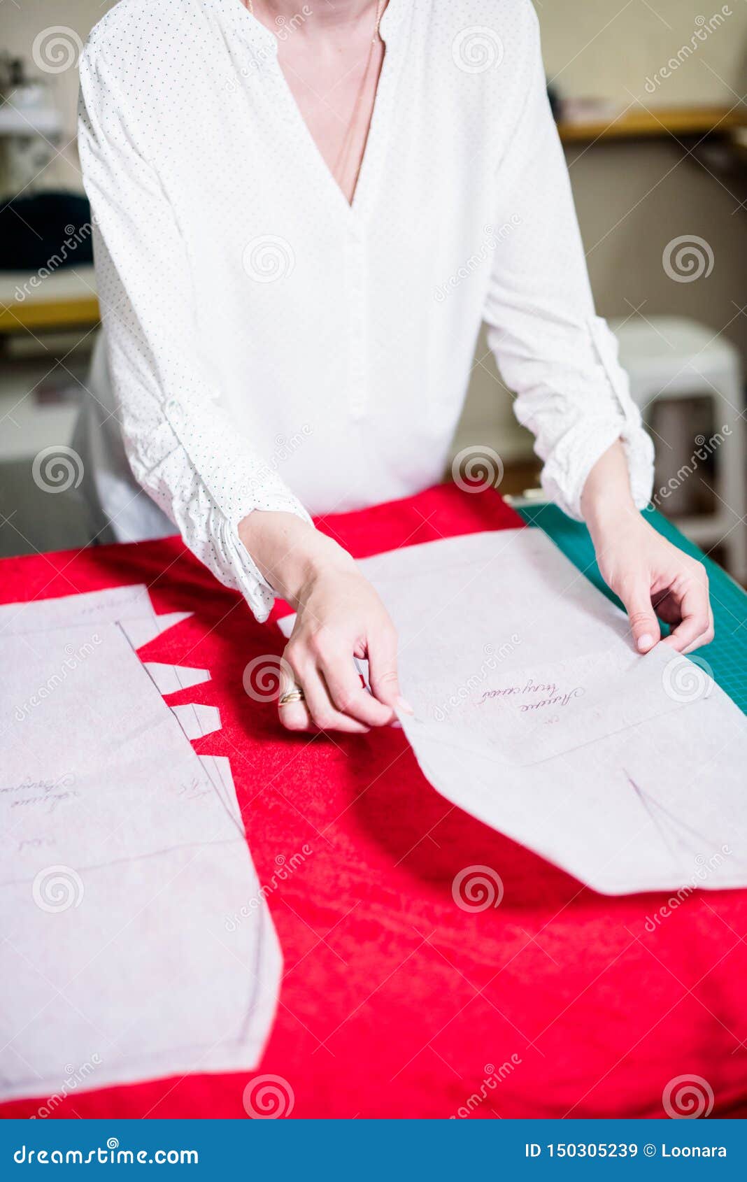 Hands of Lady Tailor Working in Her Studio, Tools and Fabric Samples on ...