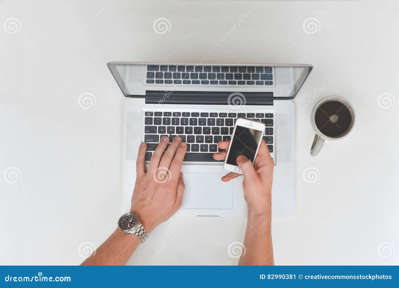 Hands With Laptop Computer And Cellphone Picture. Image: 82990381