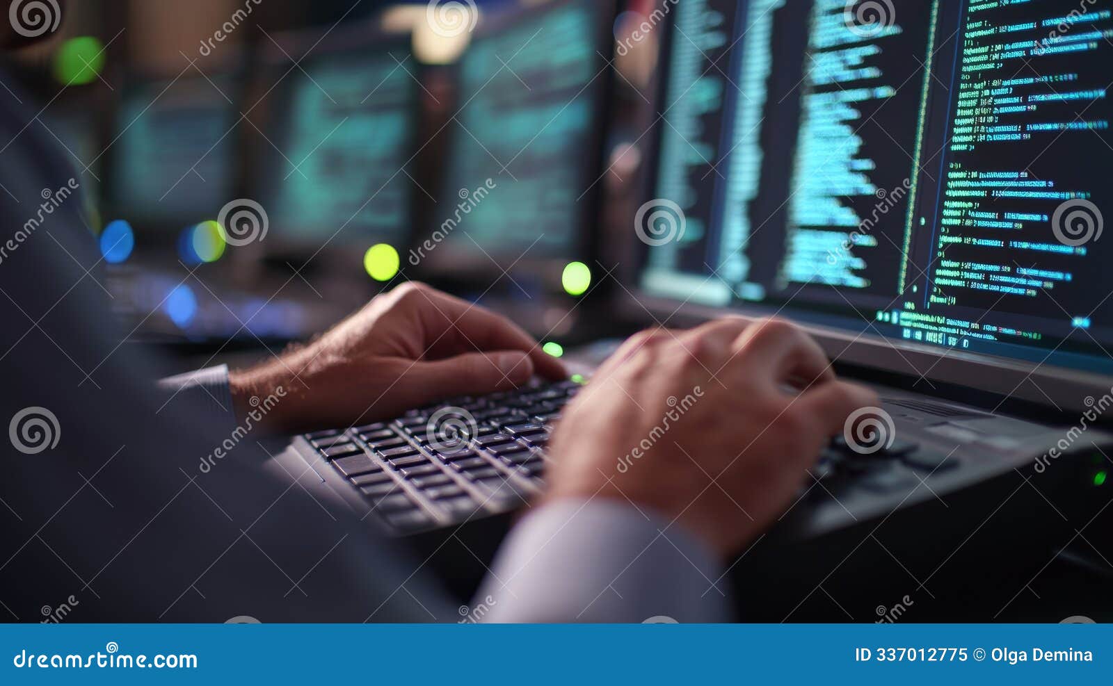 Hands on a Laptop Keyboard with Code Displayed on Multiple Screens in a ...