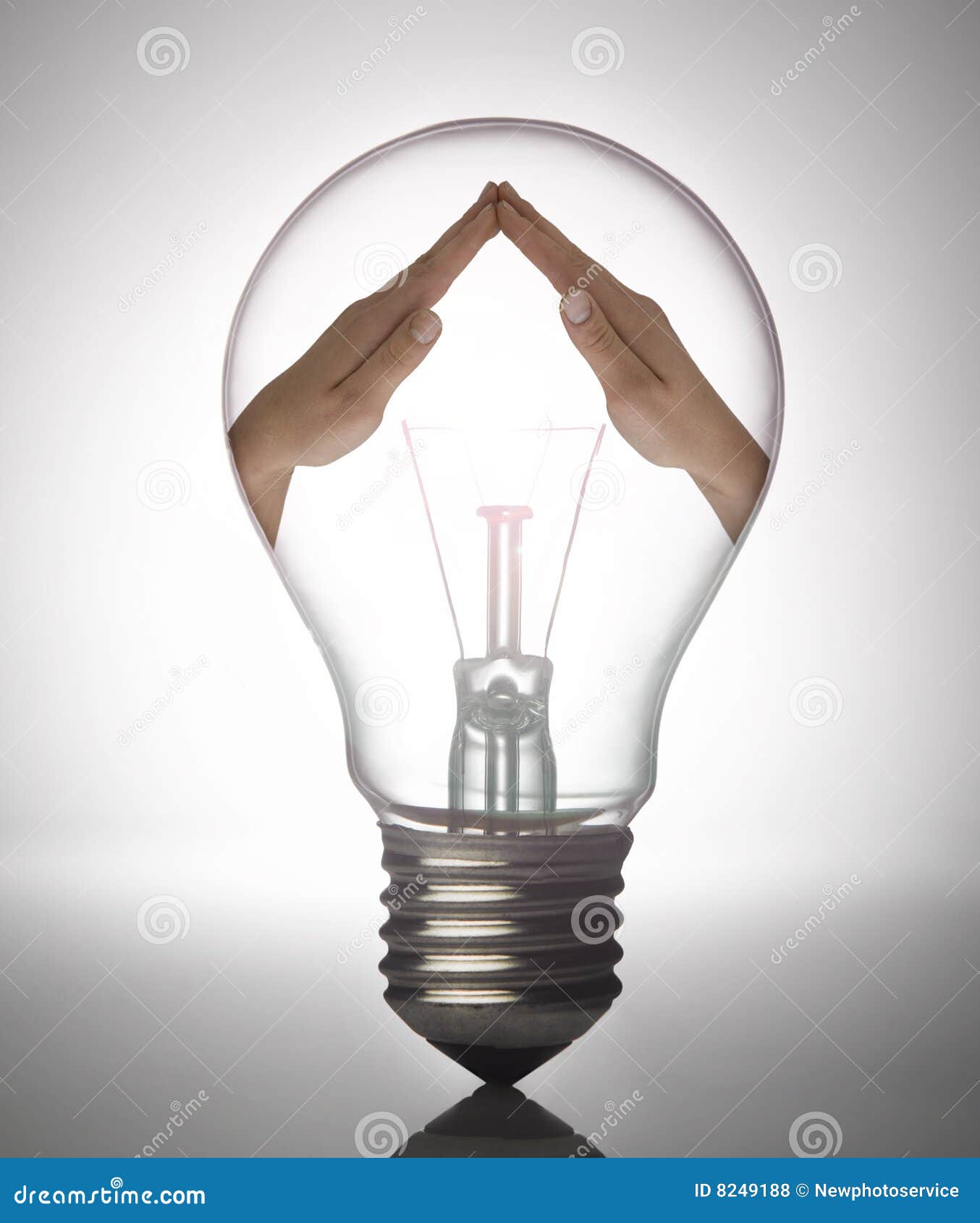 Hands in a light bulb stock photo. Image of discovery - 8249188