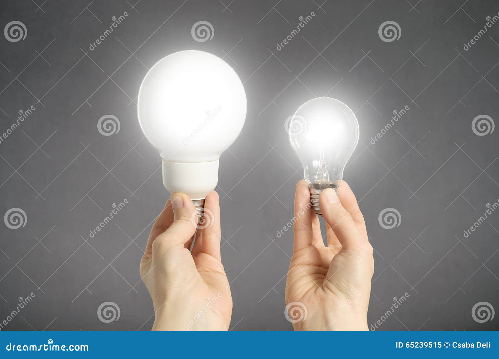 Hands with light bulbs stock image. Image of electric - 65239515