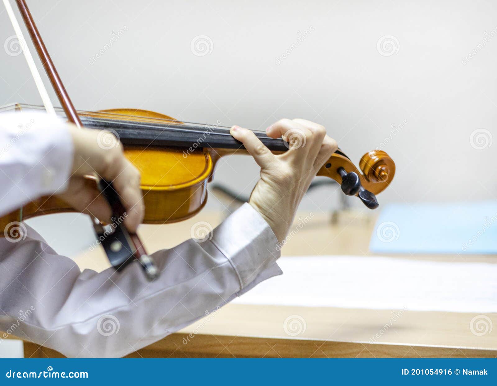 Hands of a Little Violinist while Playing the Violin, Staging the Hands ...