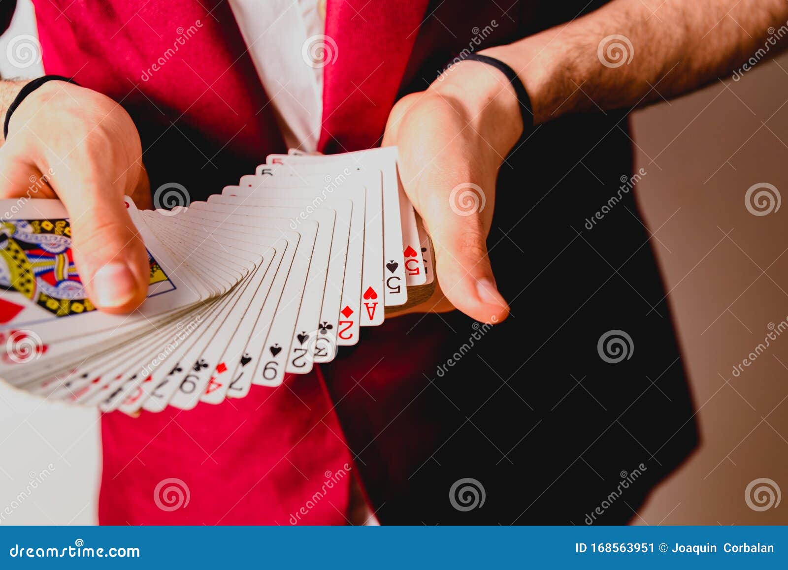 Hands of Magician Doing Tricks with a Deck of Cards Stock Image - Image ...