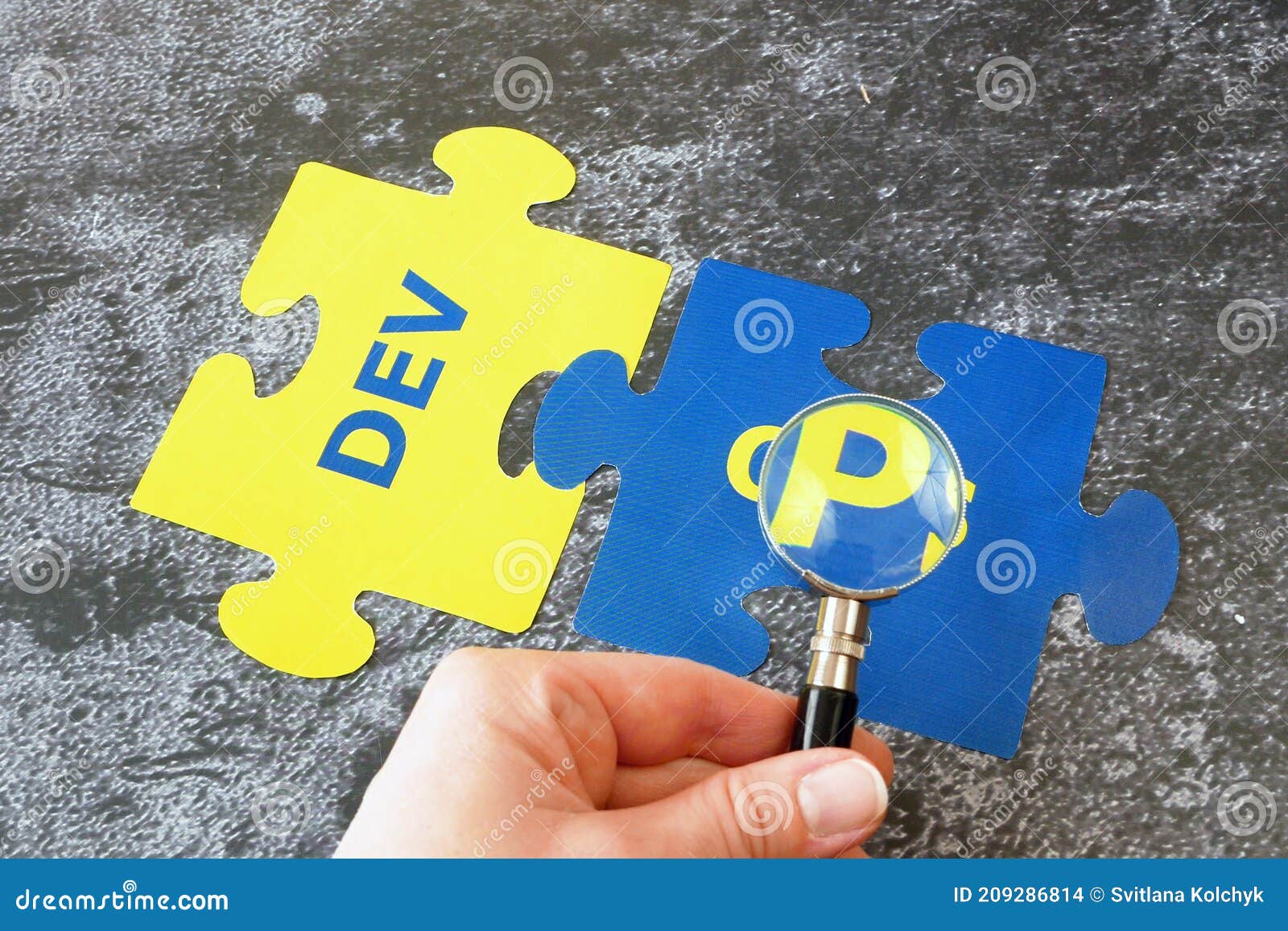 Hands with Magnifier Glass with Words Dev and Ops Puzzles. Concept for ...