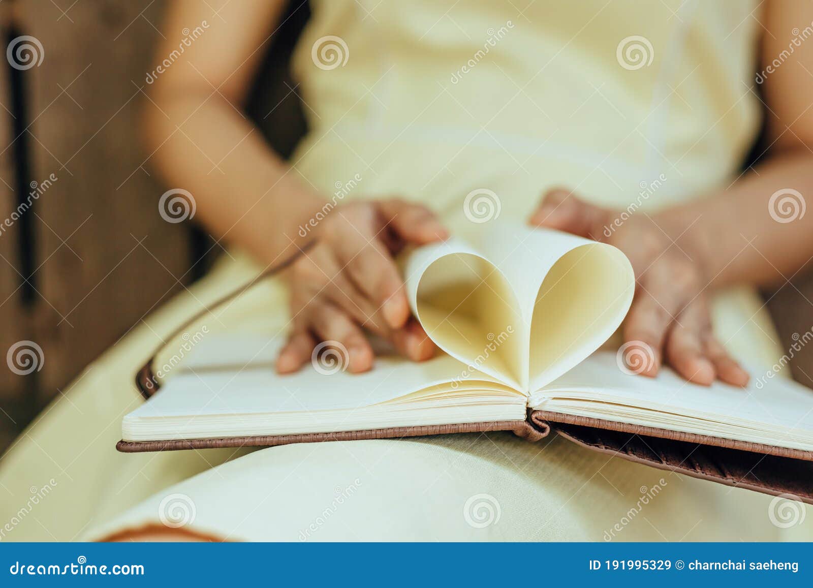 Hands Make a Book Paper Shape Heart. Love Concept Stock Image - Image ...