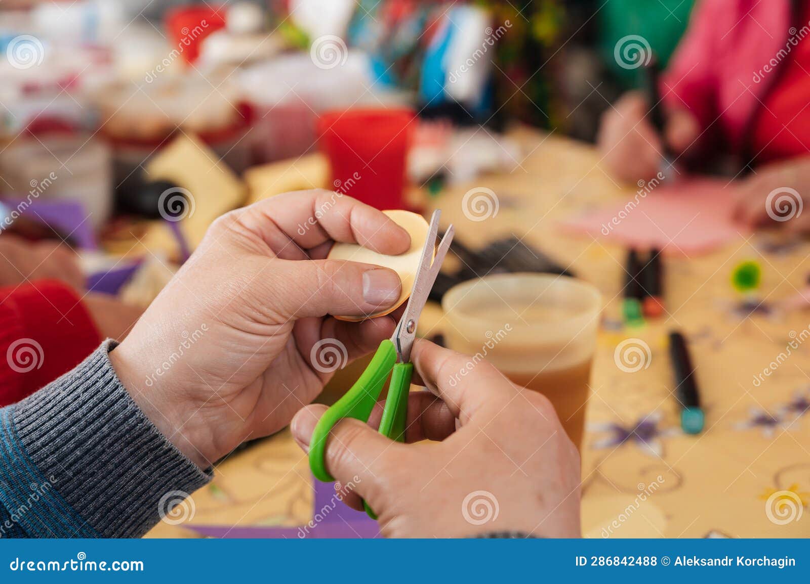Hands Make Crafts from Colored Paper at Table Stock Photo - Image of ...