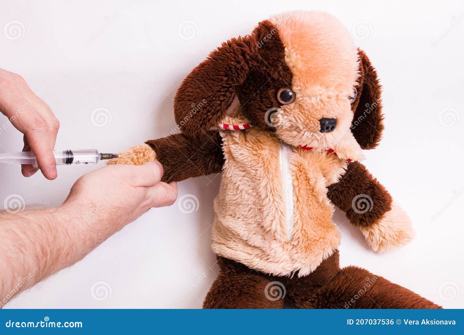 Hands Make Injection of Toy on White Background Stock Photo - Image of ...