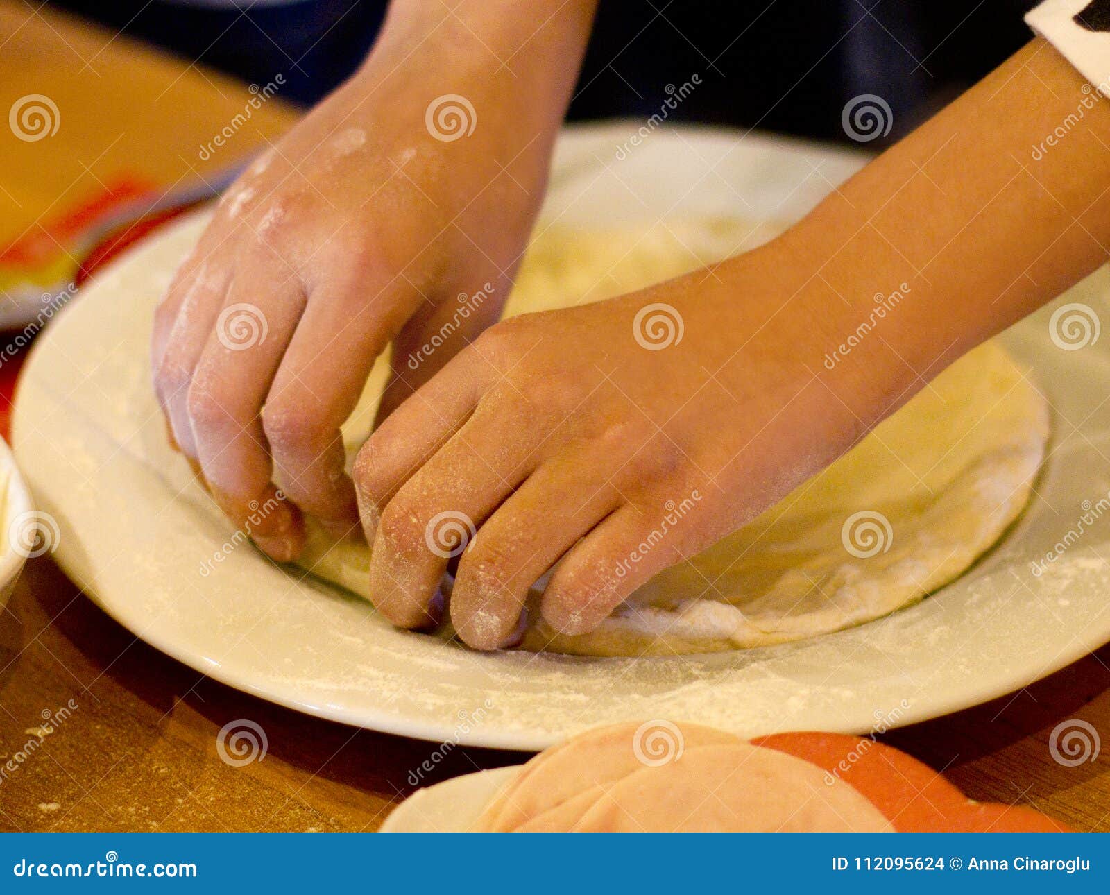 Hands Make Pizza, Work with Dough on a White Plate Stock Photo - Image ...