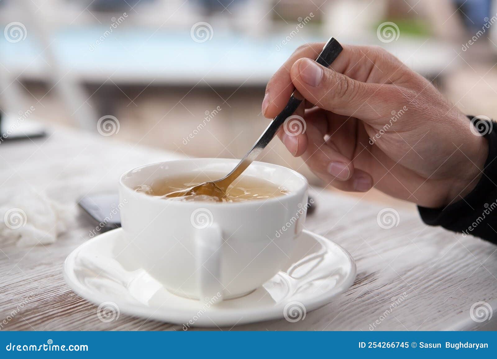 Hands making cup of tea stock image. Image of drink - 254266745
