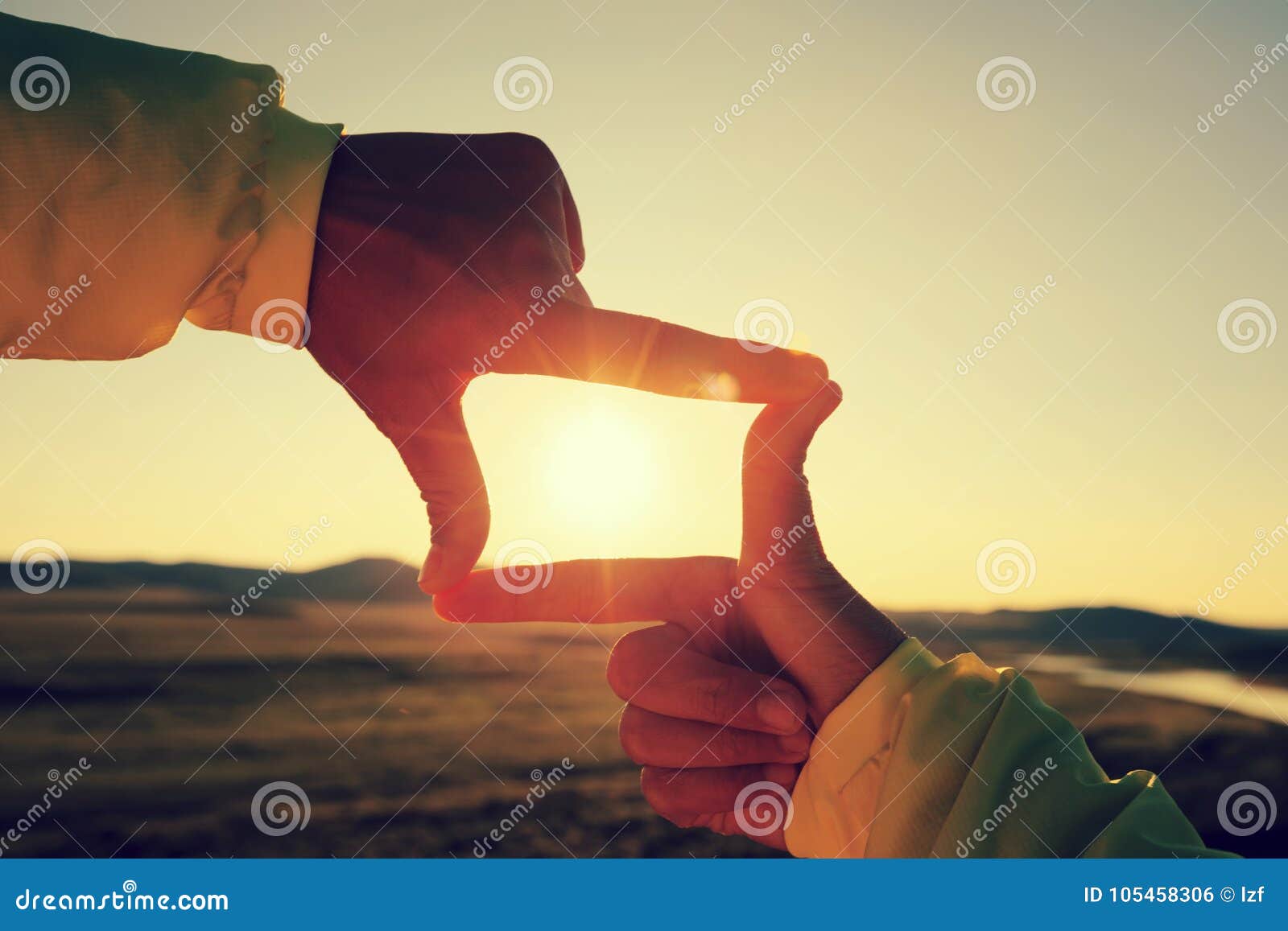 Hands Making a Frame Sign Over Sunset Sky Stock Photo - Image of golden ...