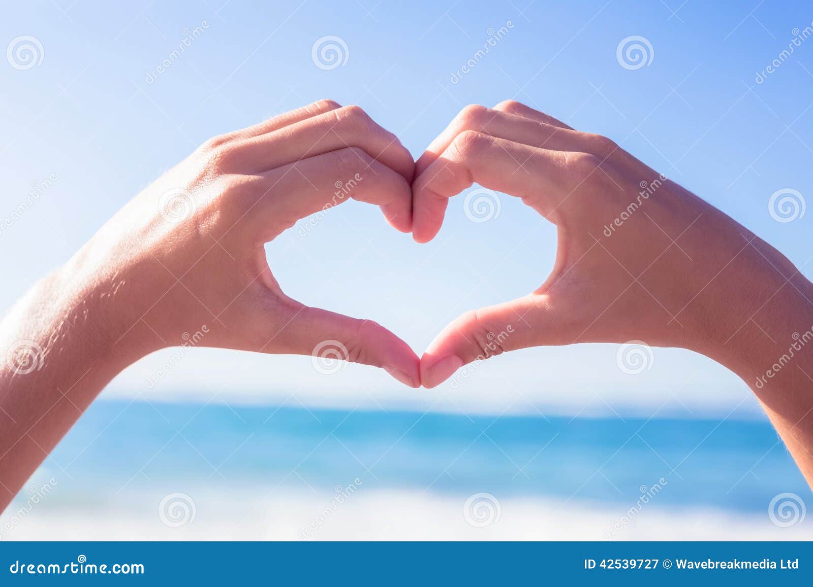 Hands Making Heart Shape on the Beach Stock Image - Image of freedom ...