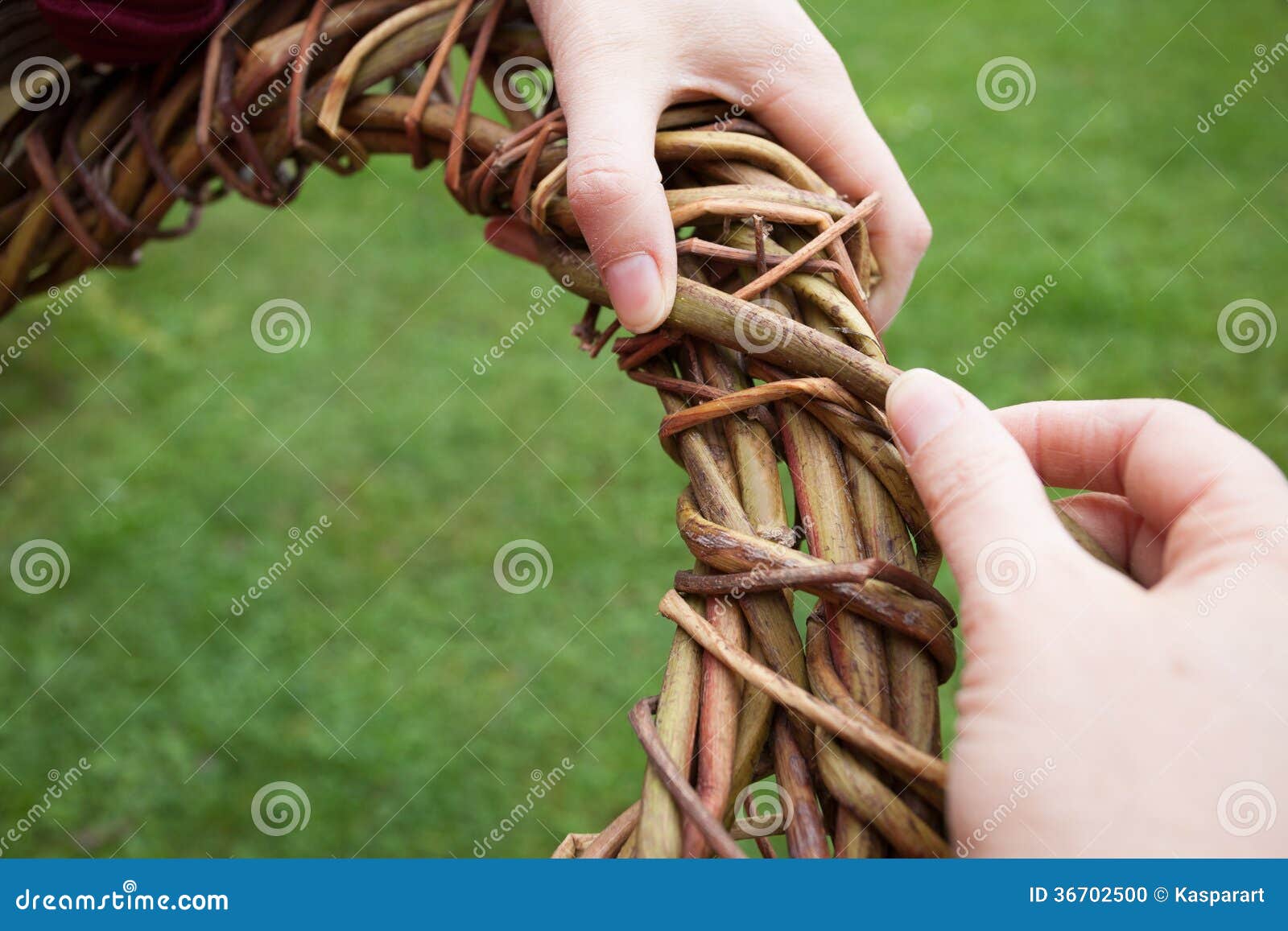 Hands making a wreath stock photo. Image of yard, person - 36702500
