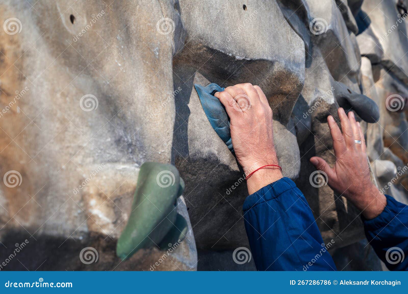 Hands of Male Climber Training on Climbing Wall Stock Photo - Image of ...