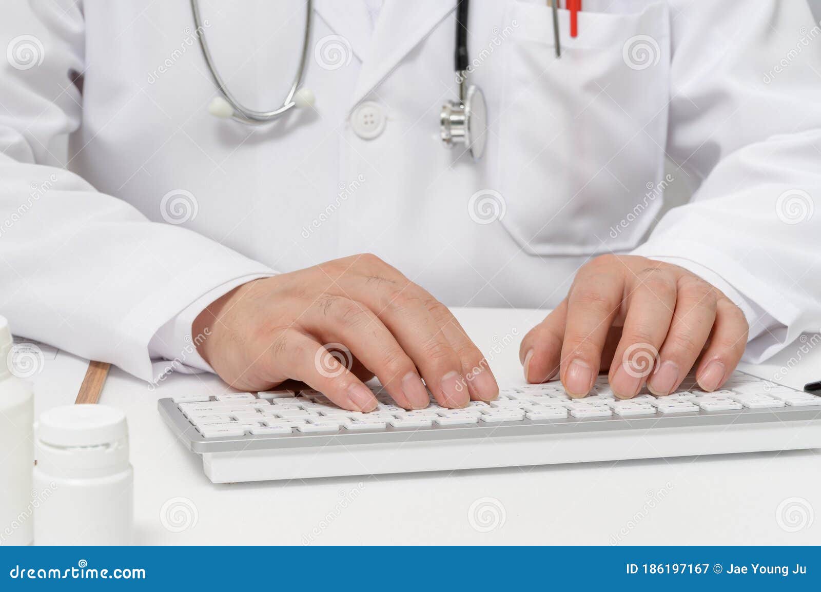 Hands of a Male Doctor Who Uses a Computer Keyboard Stock Image - Image ...