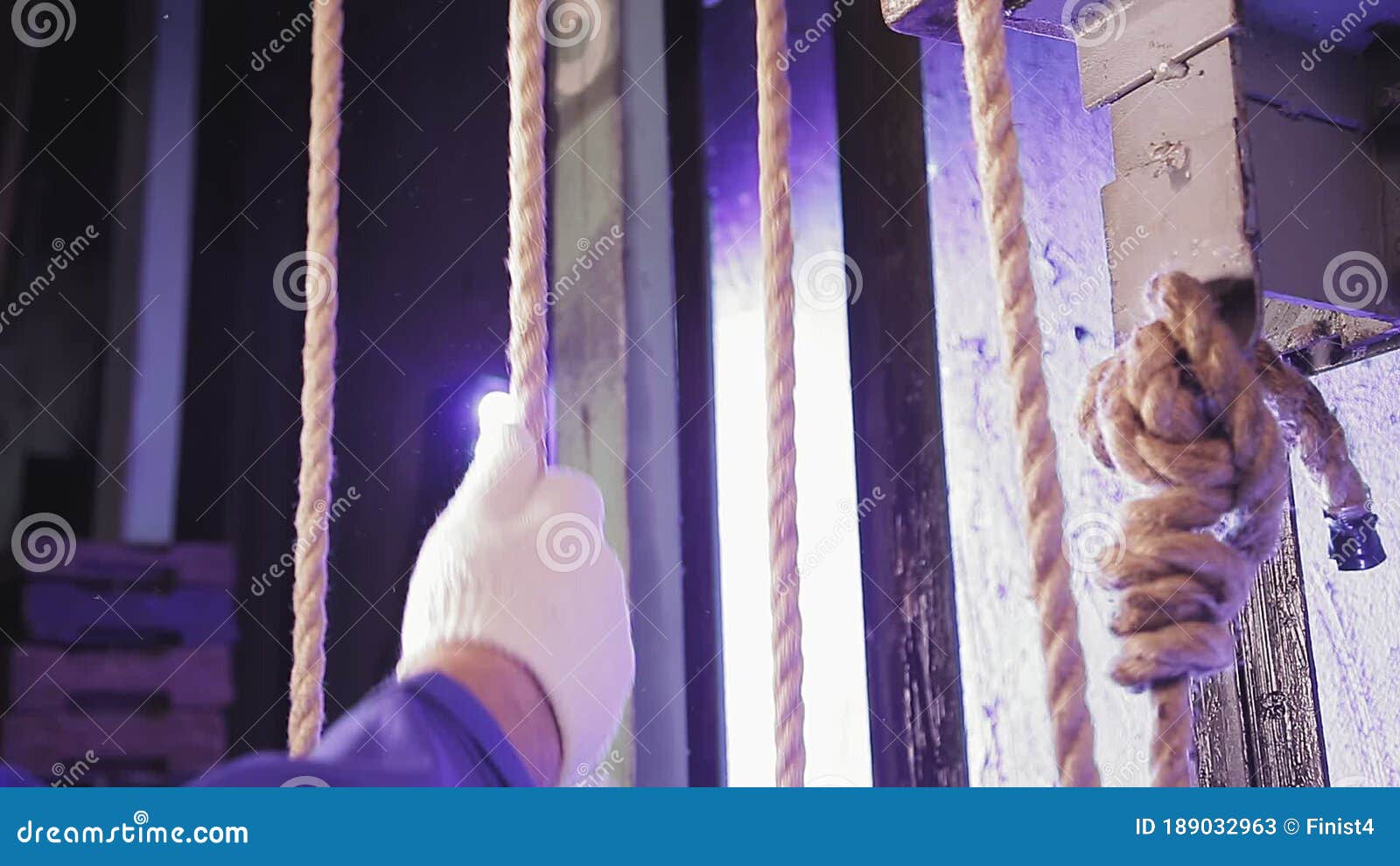 Hands of a Male Engineer Raise a Shtank with a Load Using a Cable ...