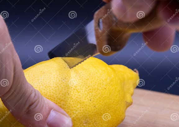 Hands of Man Cutting Lemons on Cutting Board Stock Image - Image of ... Hands of Man Cutting Lemons on Cutting Board Stock Image - Image of ...