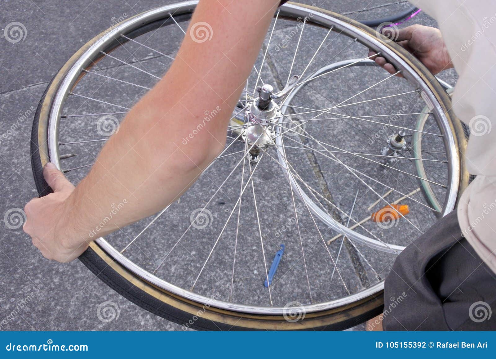 Hands of a Man Fixing a Flat Wheel Stock Photo - Image of cycle ...