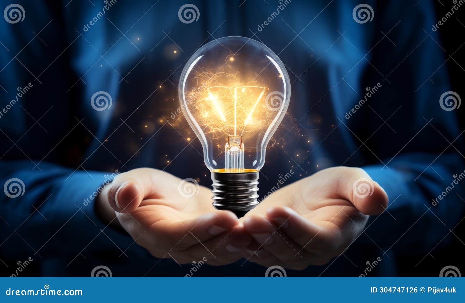 Hands of Man Holding Illuminated Light Bulb, Front View with Copy Space ...