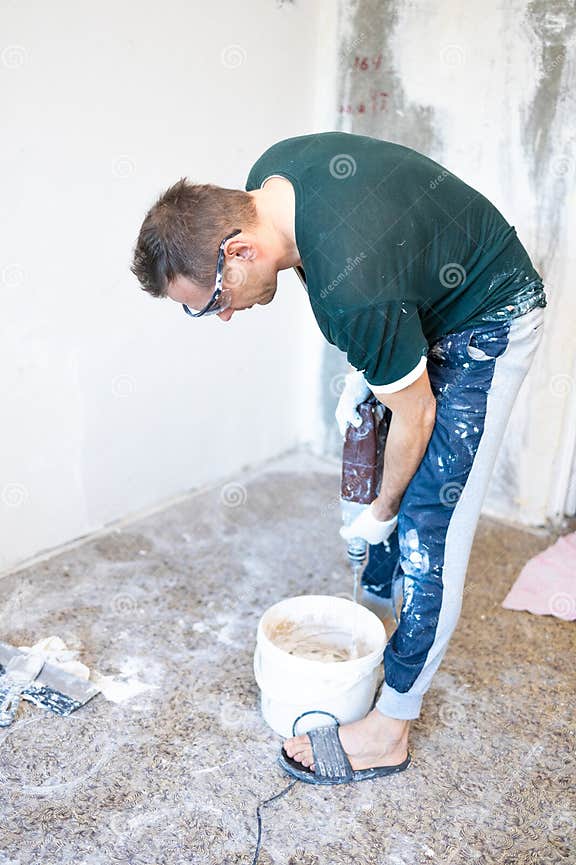 Hands Man Plasterer Construction Worker at Work with Trowel, Plastering ...