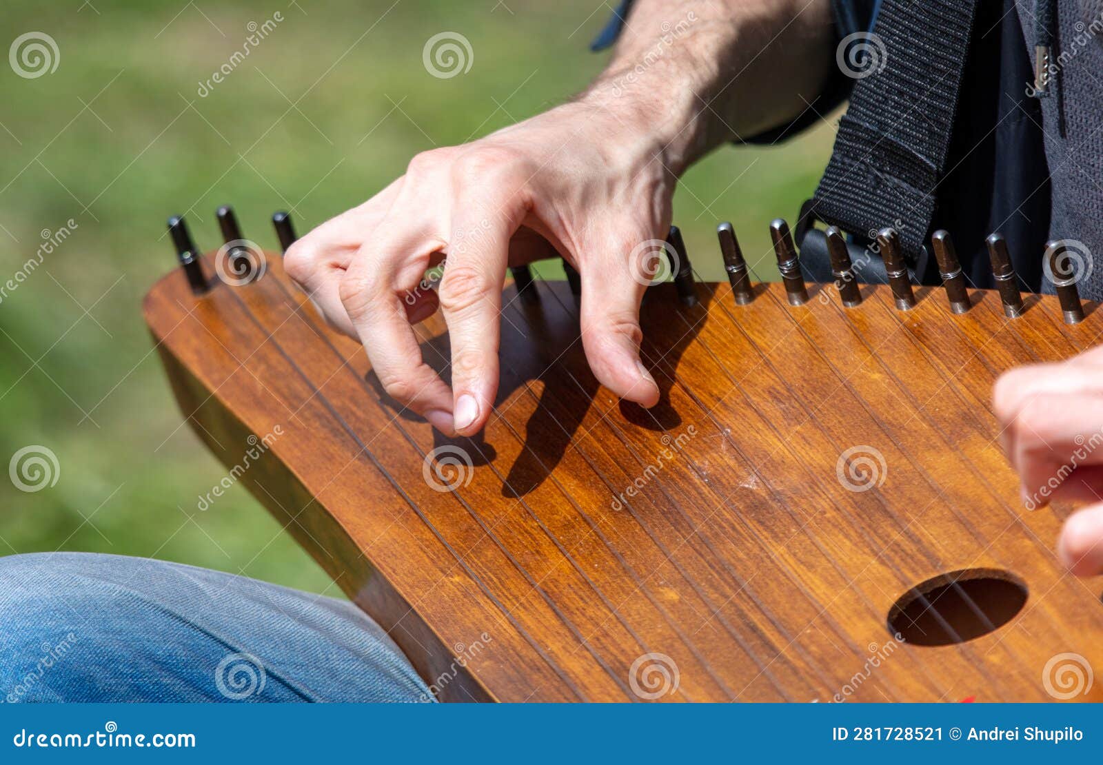 The Hands of a Man Playing the Harp on the Strings Stock Image - Image ...