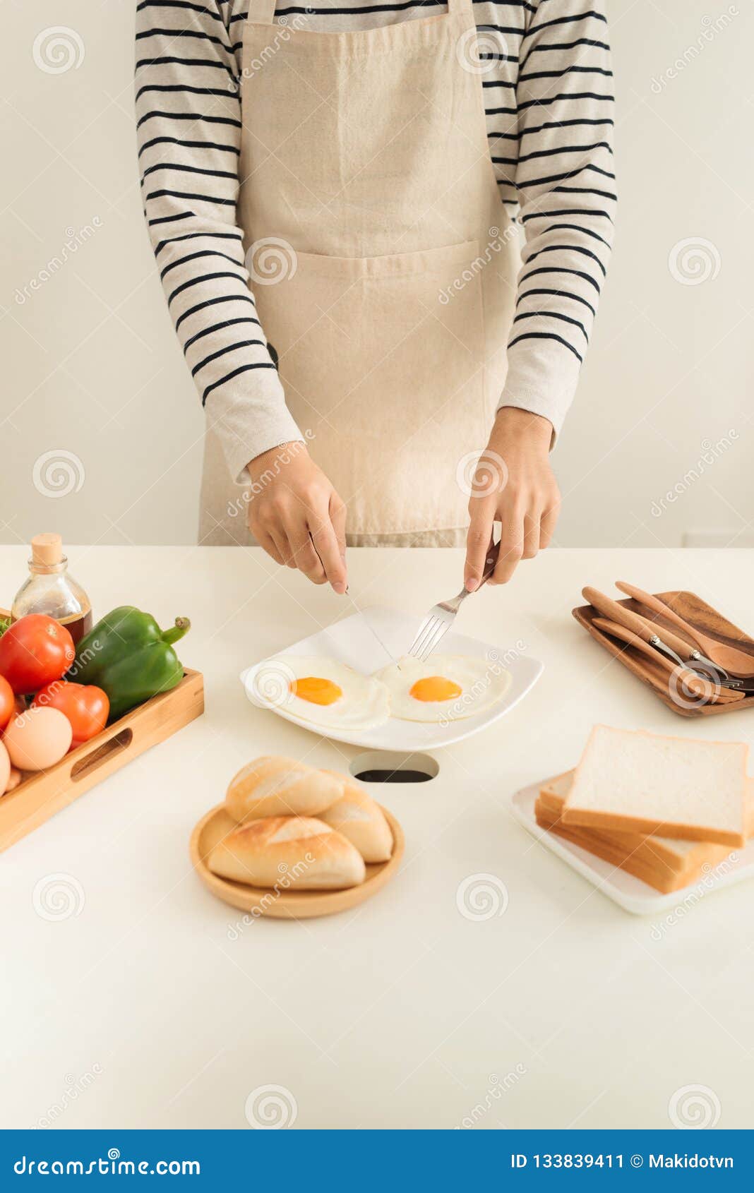 Hands of Man Prepare Breakfast with Eggs and Bread Stock Image - Image ...
