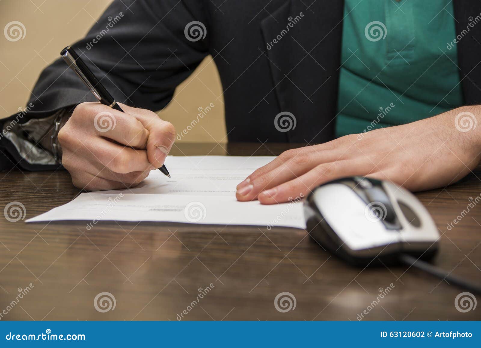 Hands of Man Signing a Sheet of Paper or Document Stock Photo - Image ...