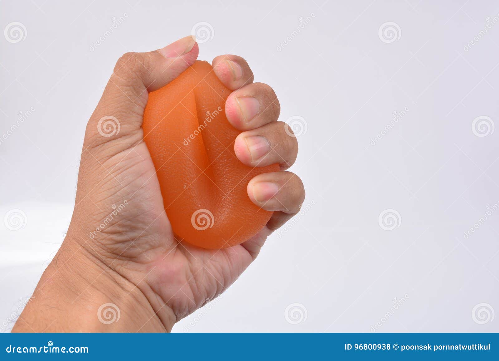 Hands of a Man Squeezing a Stress Ball Stock Photo - Image of ball ...