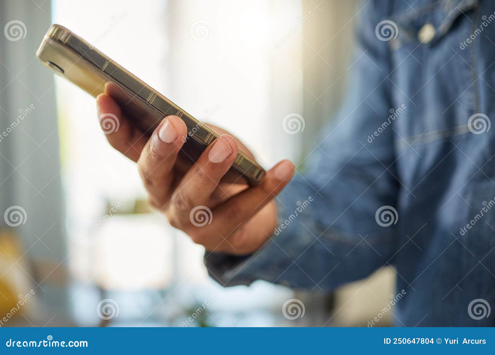 Hands of a Man Using His Cellphone To Send a Text Message. Bachelor ...