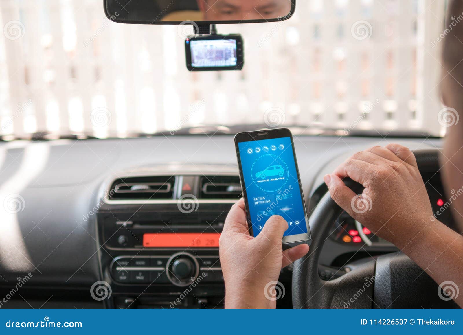 Hands of Man Using Mobile Smart Phone Vehicle Analysis Appiication in ...