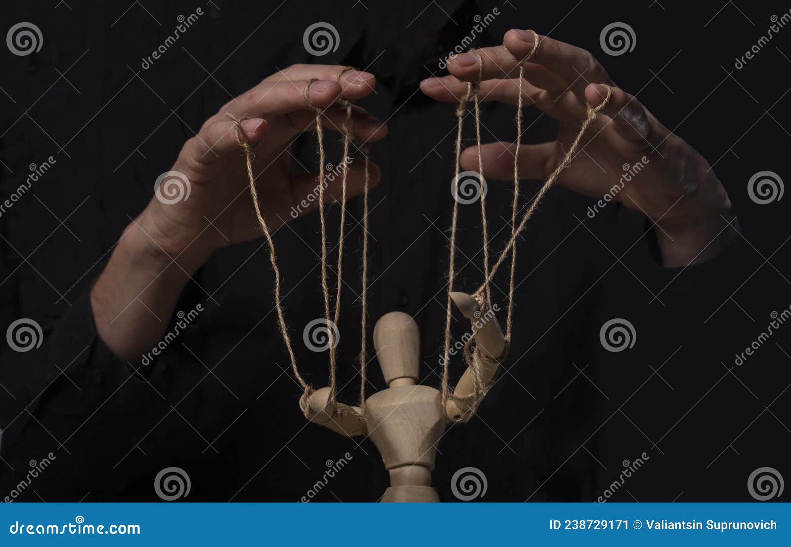 Manipulating Marionette Puppet Strings By Hand Royalty-Free Stock Image ...