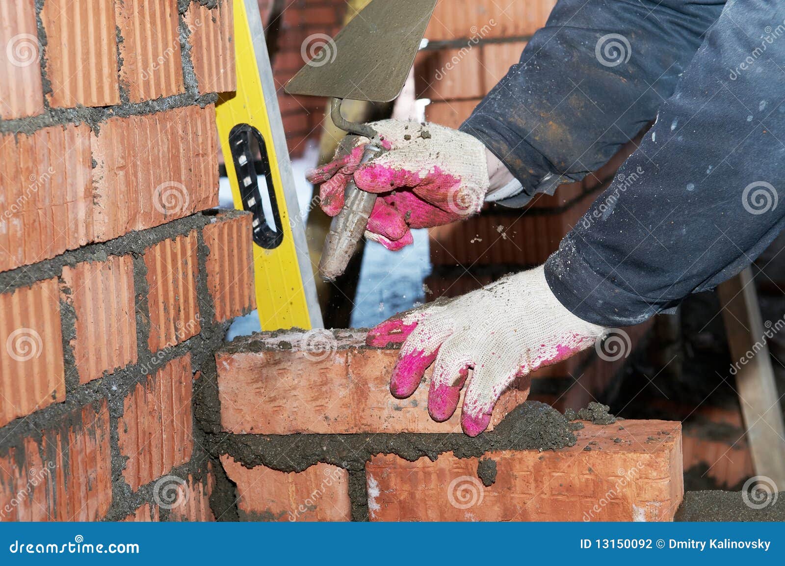 Hands of a Mason at Bricklaying Stock Photo - Image of building ...