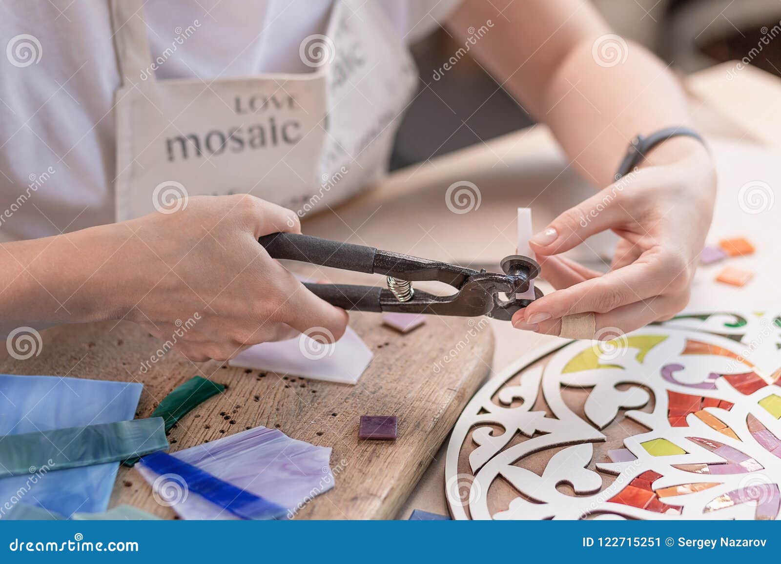 Hands of Master Working on New Modern Colorful Mosaic. Close-up Stock ...