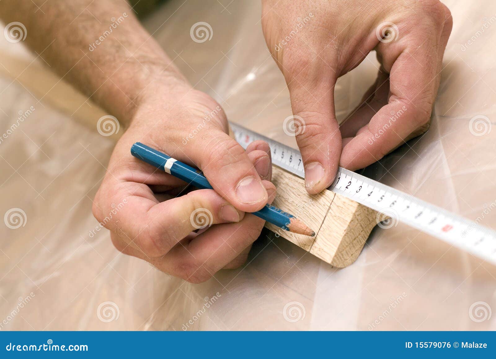 Hands measuring wood stock photo. Image of measuring - 15579076
