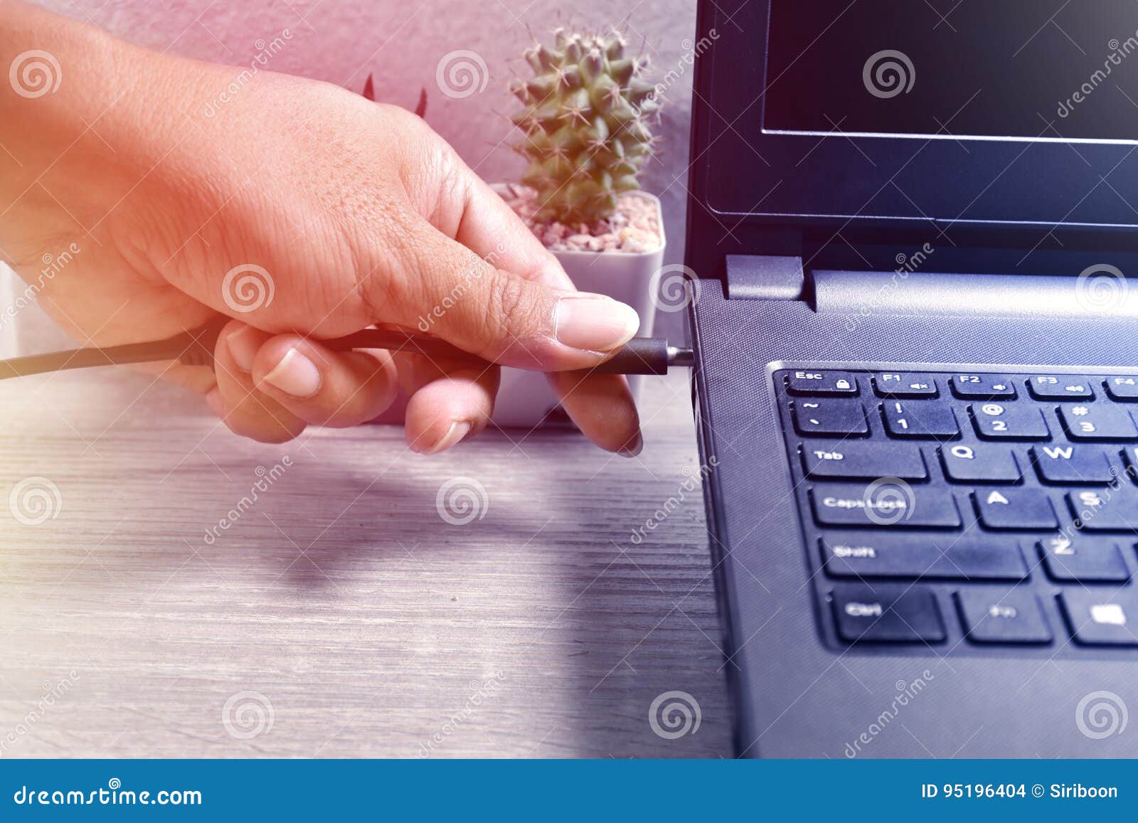 Plug In Power Outlet Adapter Cord Charger On White Wall Of The Laptop ...