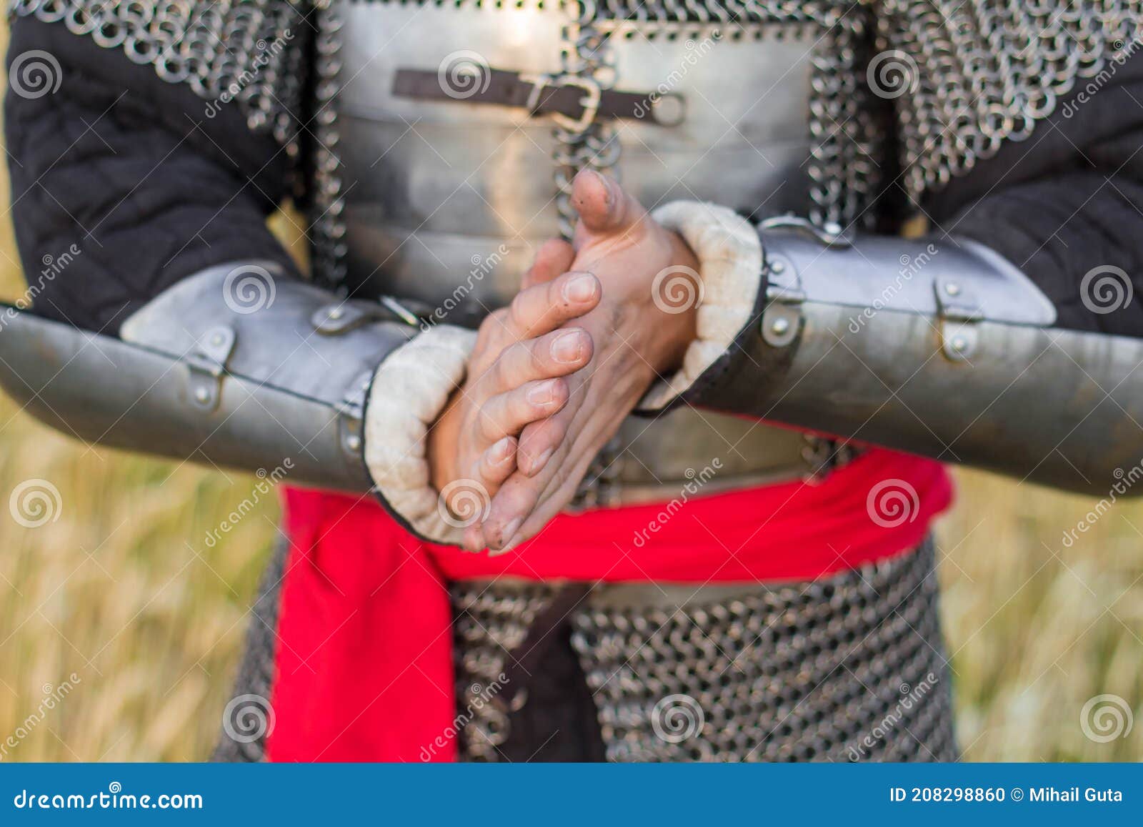 Hands of a Medieval Warrior, Close-up, Stained with Earth. Holds the ...