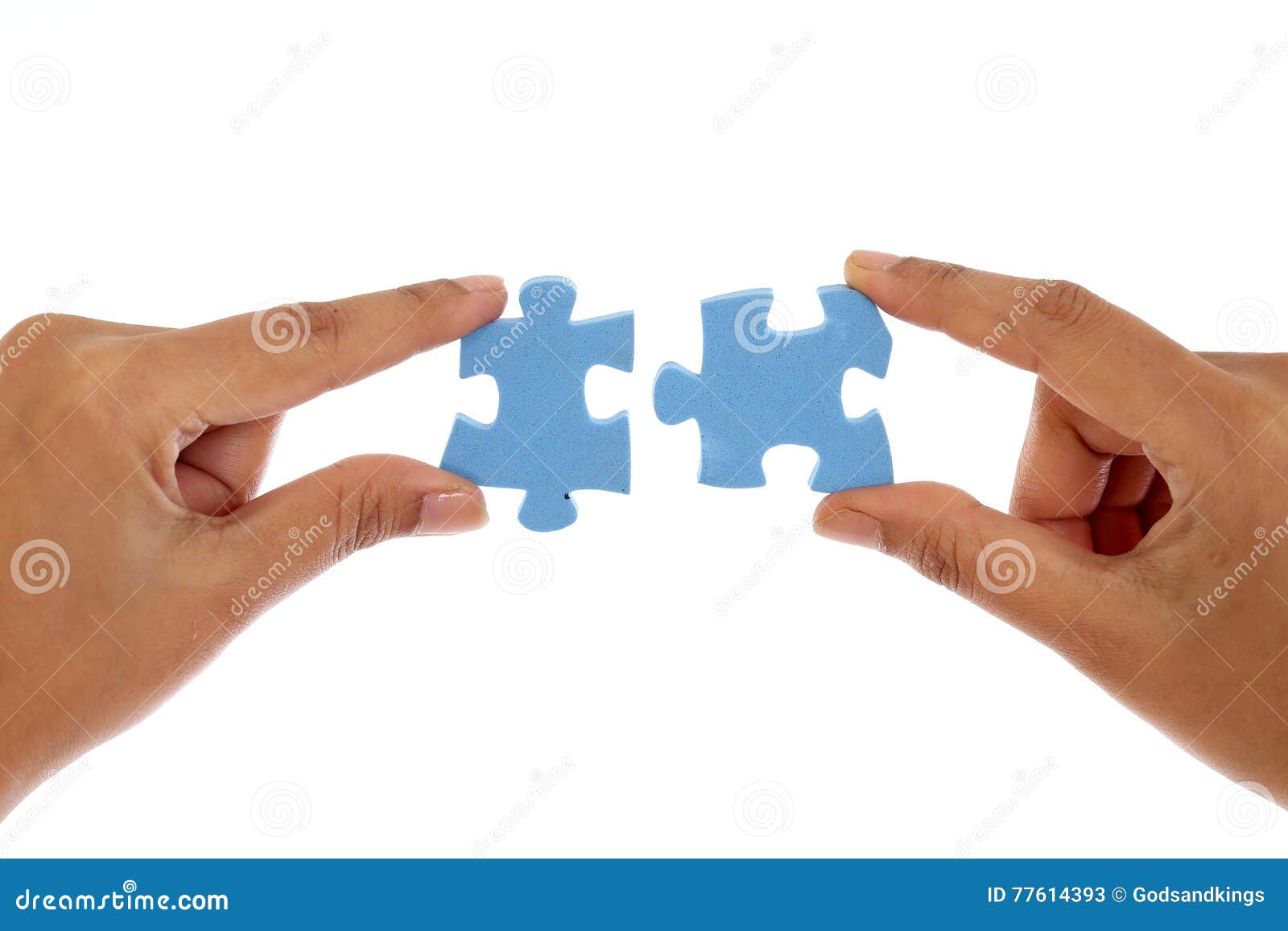 Hands Merging Two Jigsaw Puzzle Pieces Against White Stock Image ...
