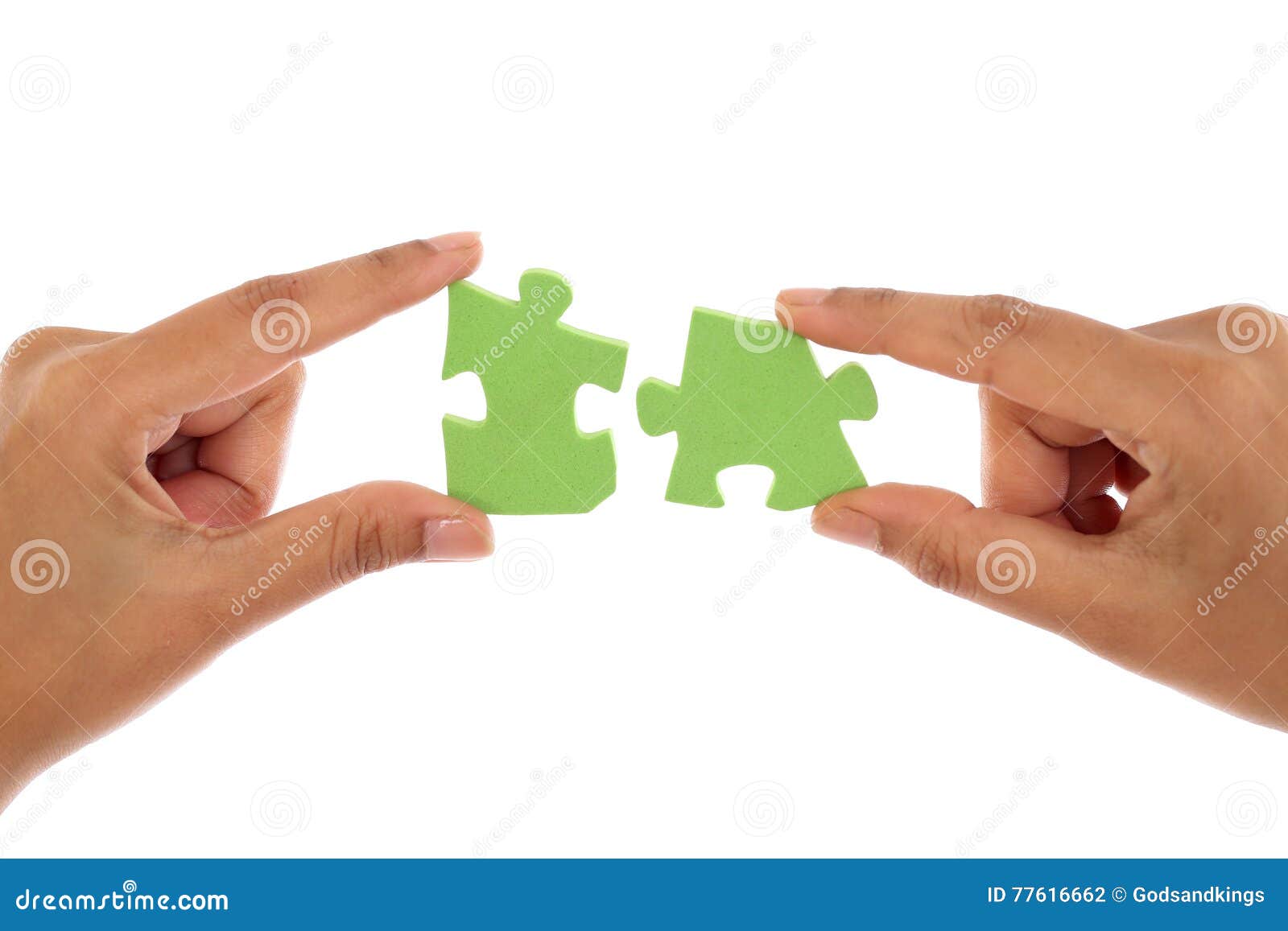 Hands Merging Two Jigsaw Puzzle Pieces Against White Stock Photo ...