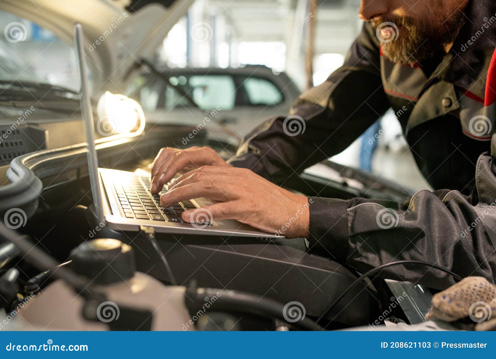 Hands of Middle Aged Male Worker of Car Maintenance Service Using ...