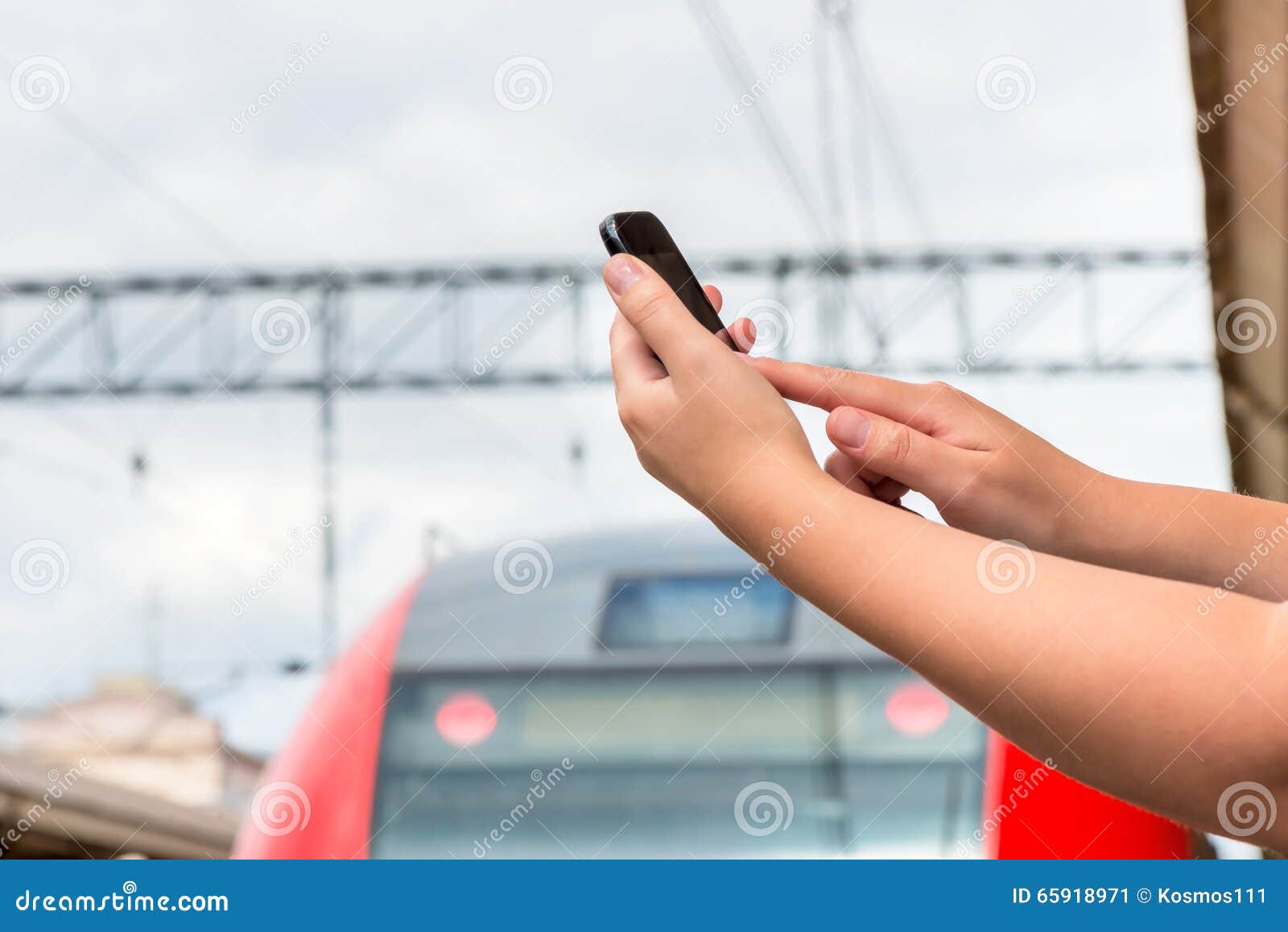 Hands with a Mobile Phone at Railway Station Stock Image - Image of ...