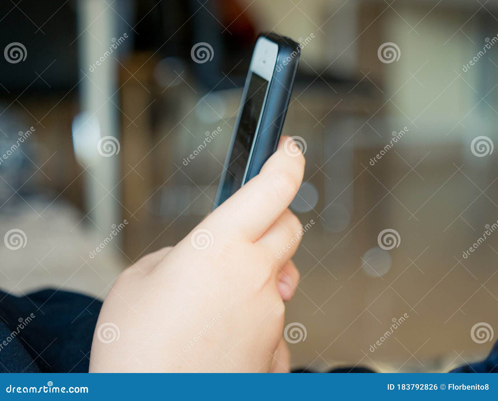 Hands with mobile writing stock photo. Image of focus - 183792826