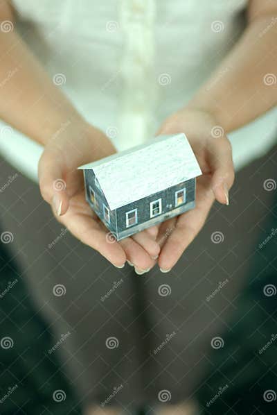 Hands with model of house. stock photo. Image of habitat - 1109314