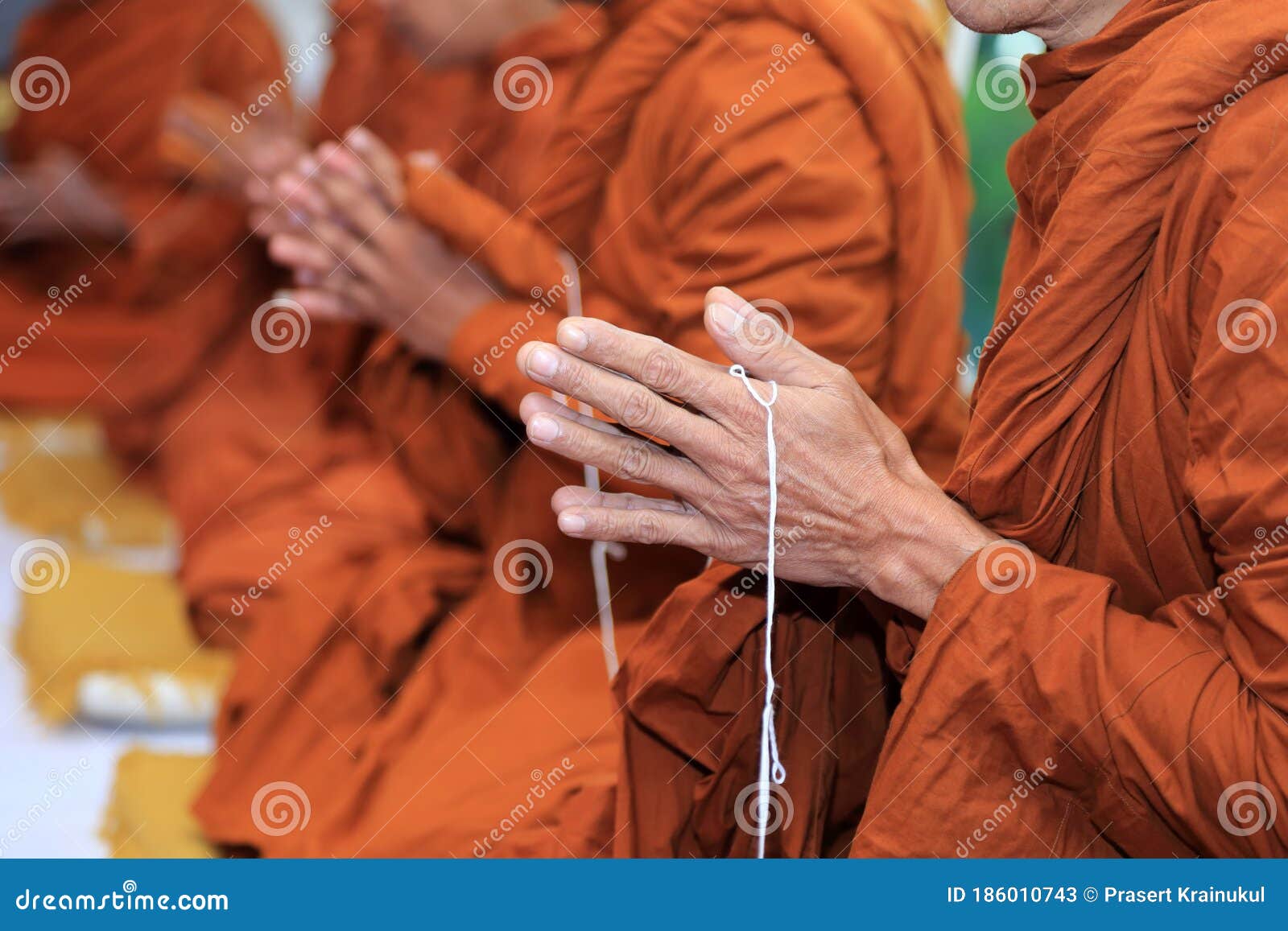Hands of a monk praying stock image. Image of culture - 186010743