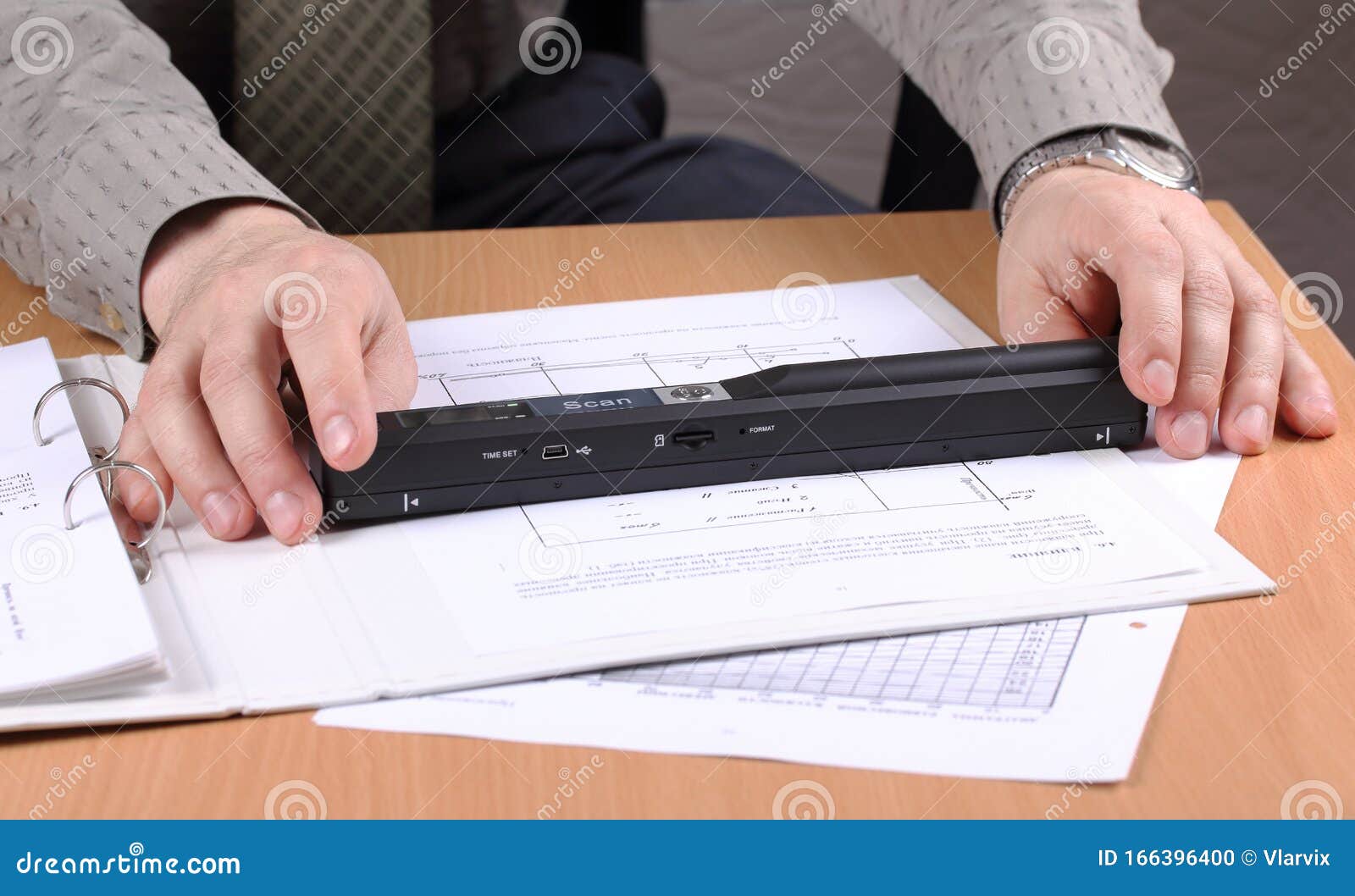 Hands Move a Hand Scanner while Scanning a Document Stock Photo - Image ...