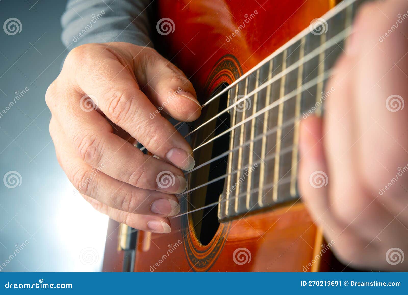 Hands of the Musician Playing on Classical Guitar Stock Image - Image ...
