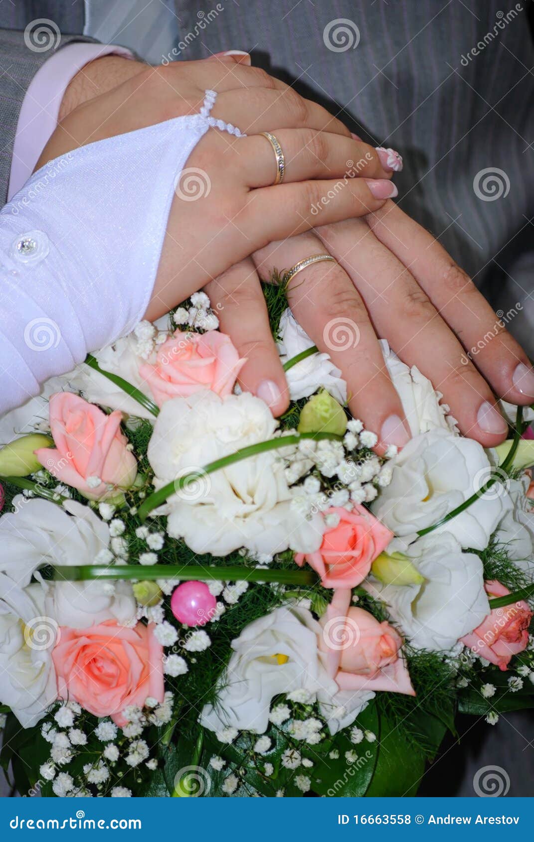 Hands of Newly-married Couple on a Wedding Bouquet Stock Photo - Image ...