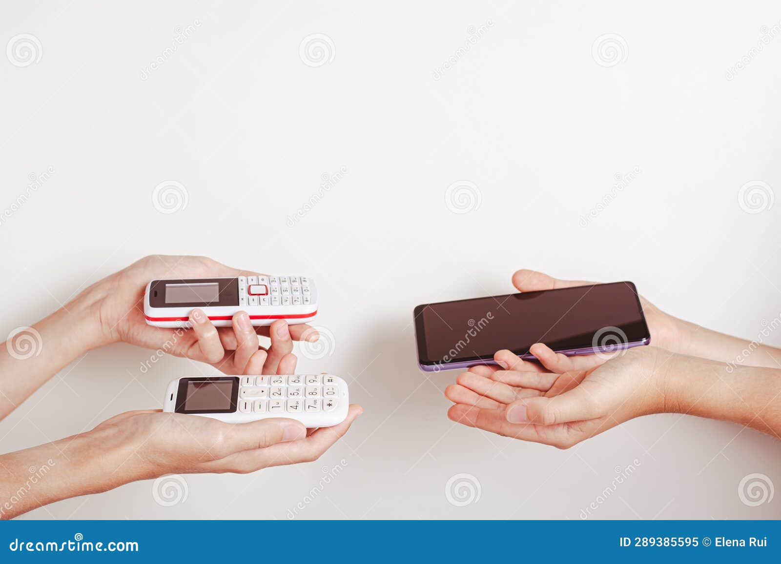 Hands Offer an Exchange of a Push-button Phone for a Smartphone Stock ...