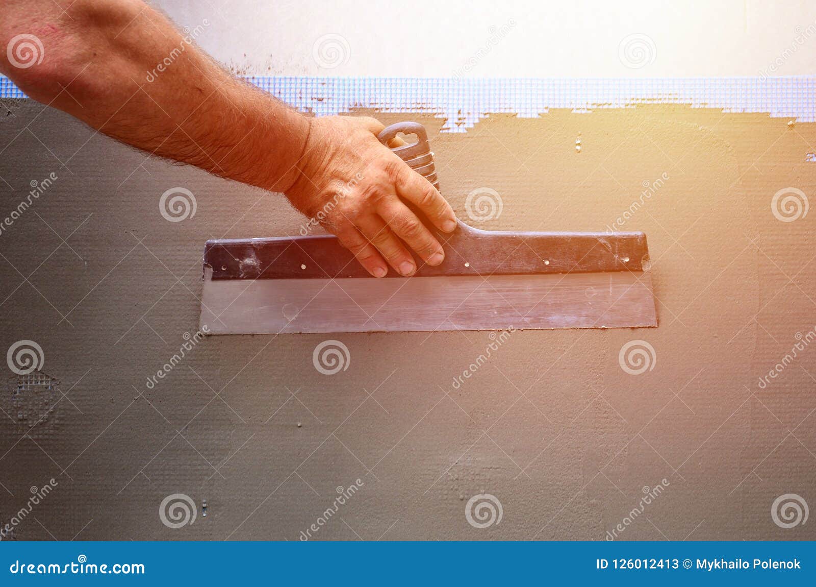 Hands of an Old Manual Worker with Wall Plastering Tools Renovating ...