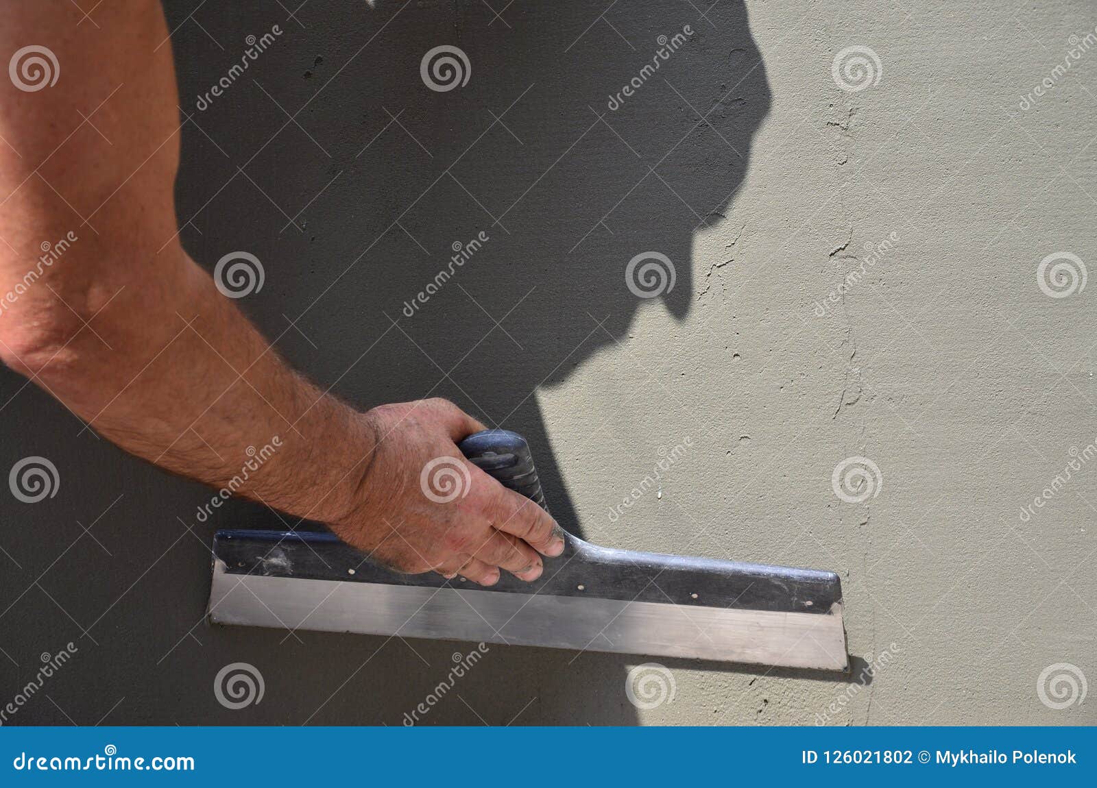 Hands of an Old Manual Worker with Wall Plastering Tools Renovating ...