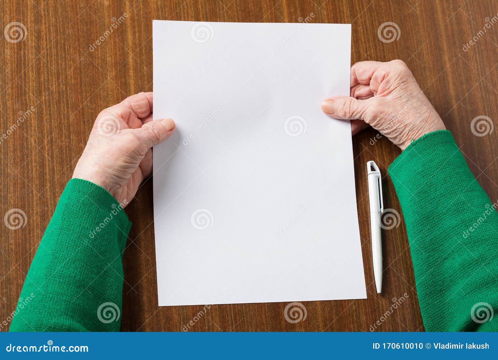Old hands with blank paper stock photo. Image of page - 170610010
